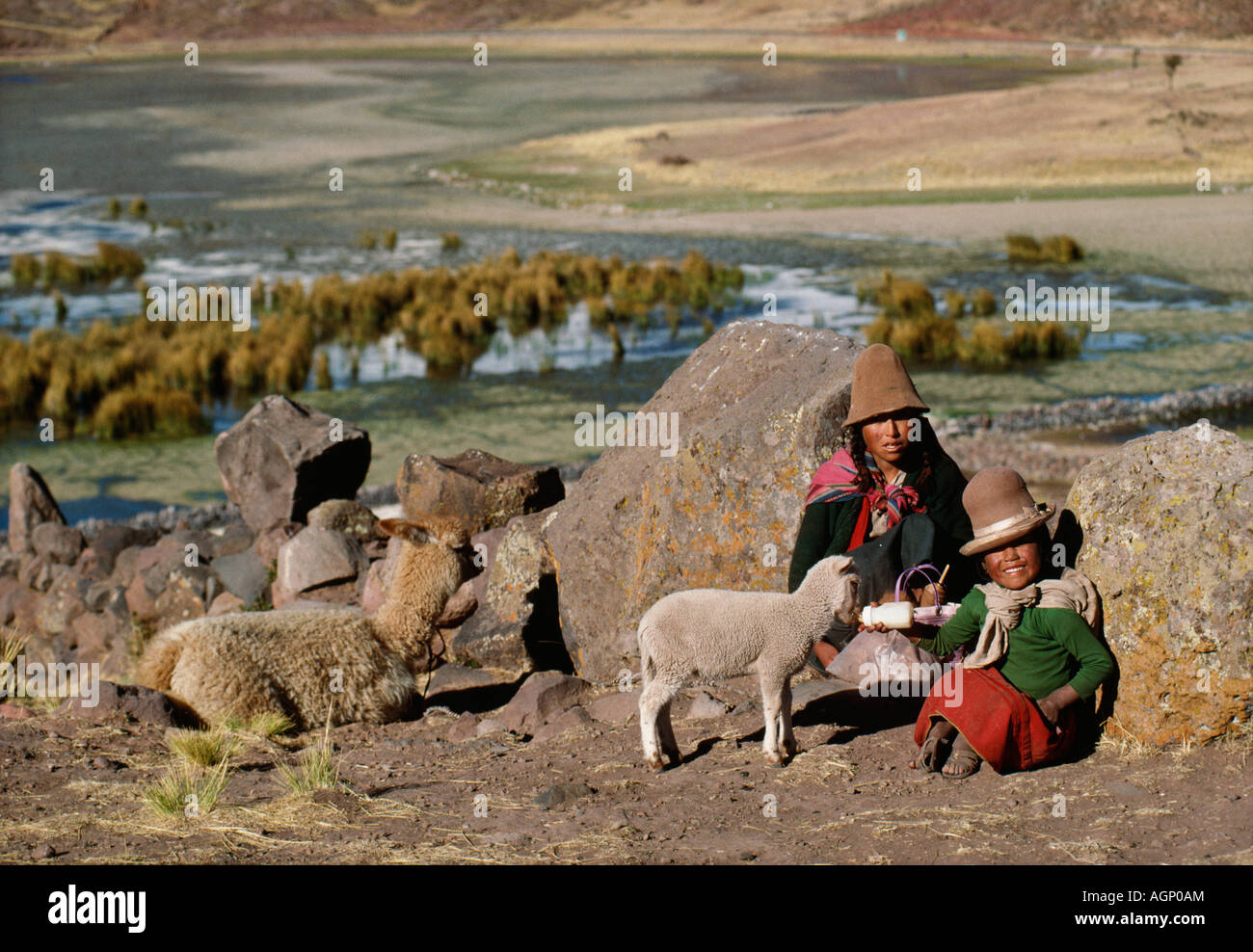 Peru, Titicaca lake, Tequile island, Indian daughter with mother ...