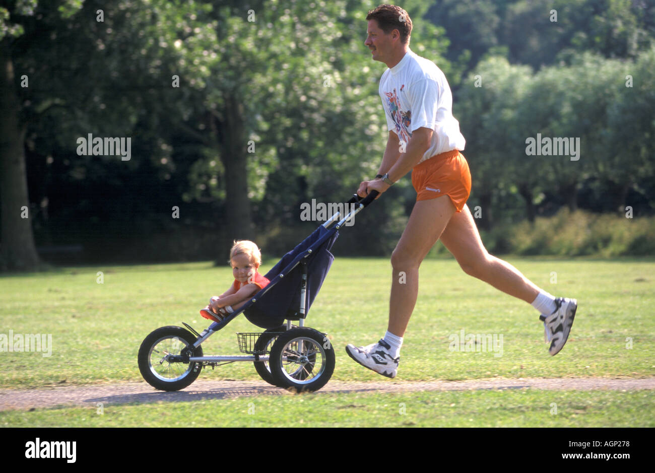 Father and child jogging Stock Photo - Alamy