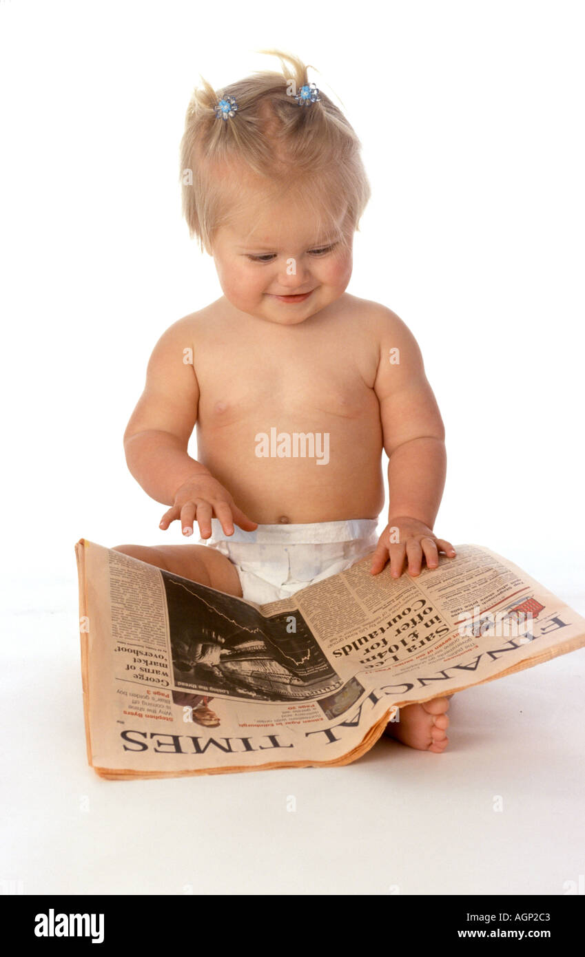 little girl reading Financial Times Stock Photo - Alamy