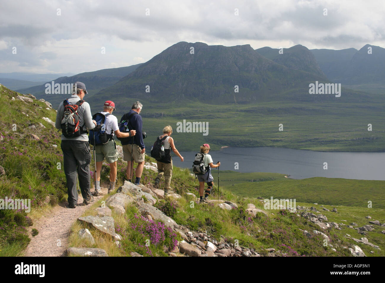 Walkers descending Stac Pollaidh in Inverpolly, Scotland Stock Photo ... Walkers descending Stac Pollaidh in Inverpolly, Scotland Stock Photo ...