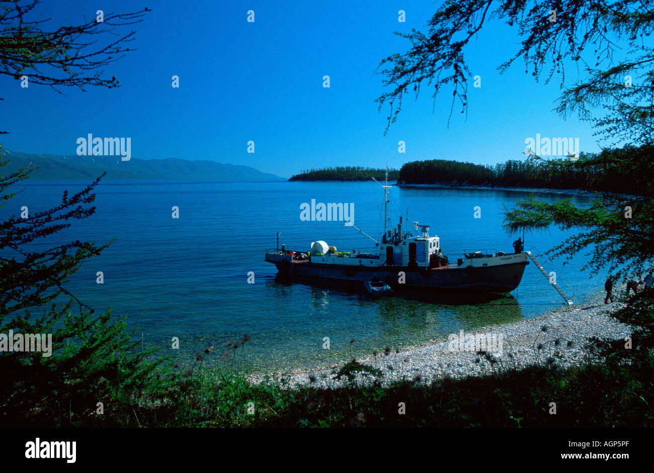 Boat at shore Stock Photo - Alamy