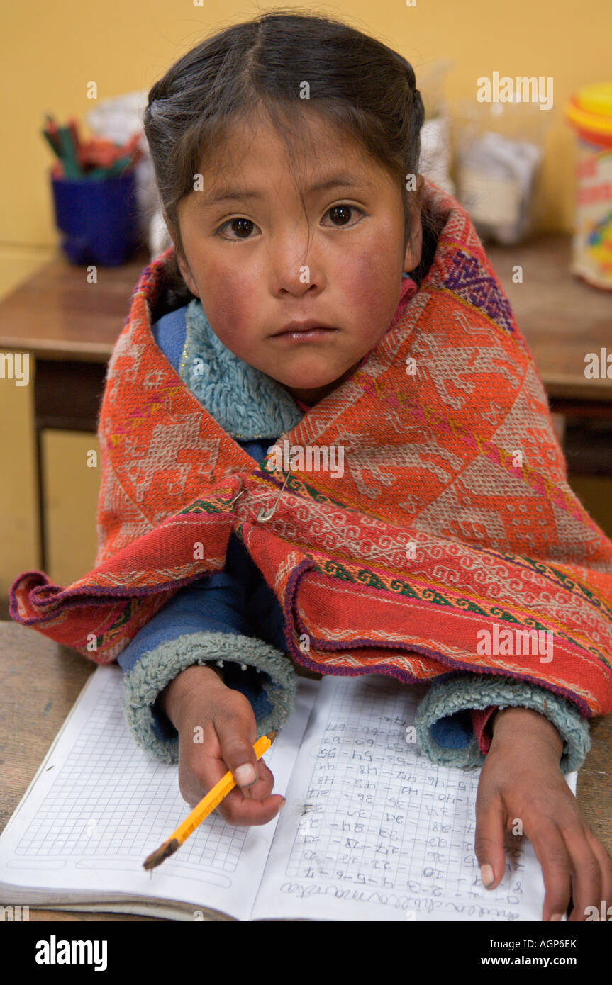 Peru, Huilloc, Portrait of girl writing in classroom Stock Photo - Alamy