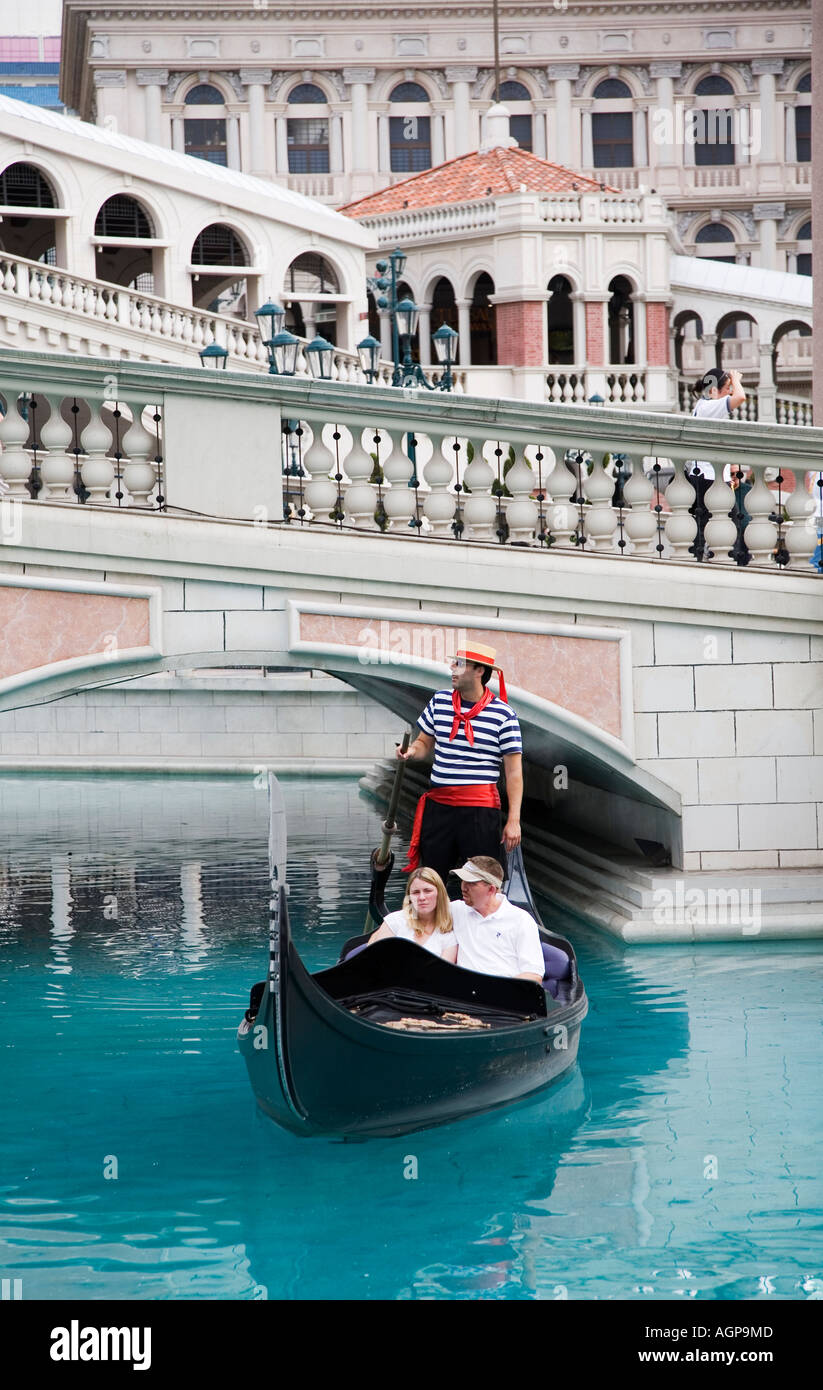 Las Vegas Nevada A couple rides in a gondola at the Venetian Hotel ...