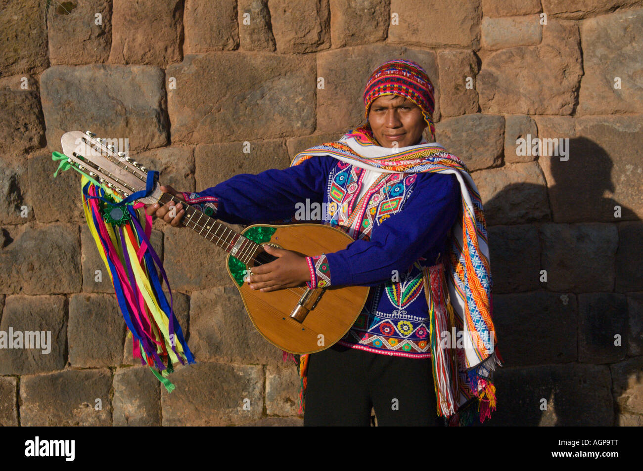 Peru, Tipon Inca ruins, Male musician with guitar Stock Photo - Alamy