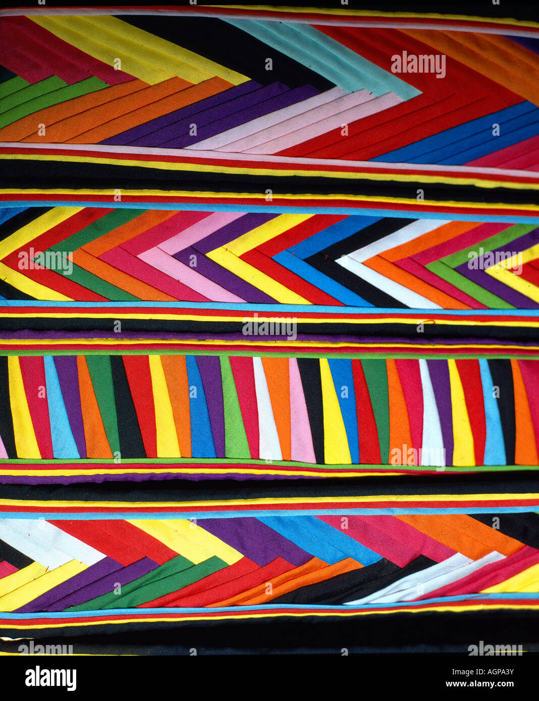 South America, Peru, Cinceros. Bold colors in fabric design in market ...