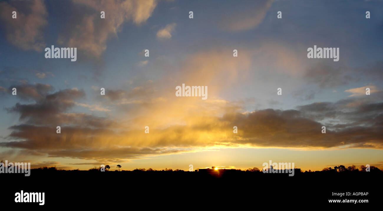 yellow sunrise sky Stock Photo - Alamy