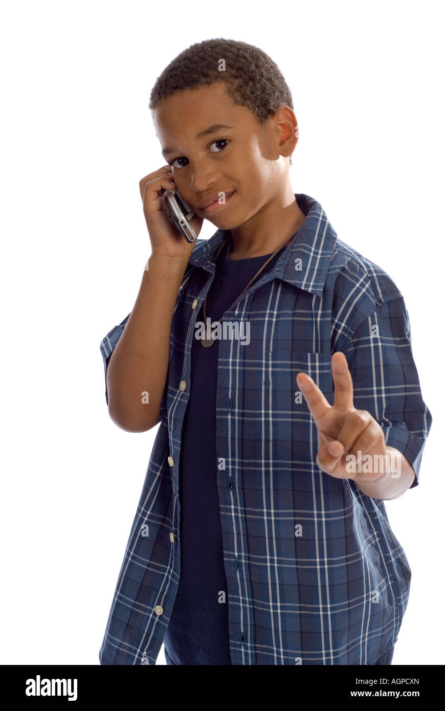 African American boy talking on cell phone Stock Photo - Alamy