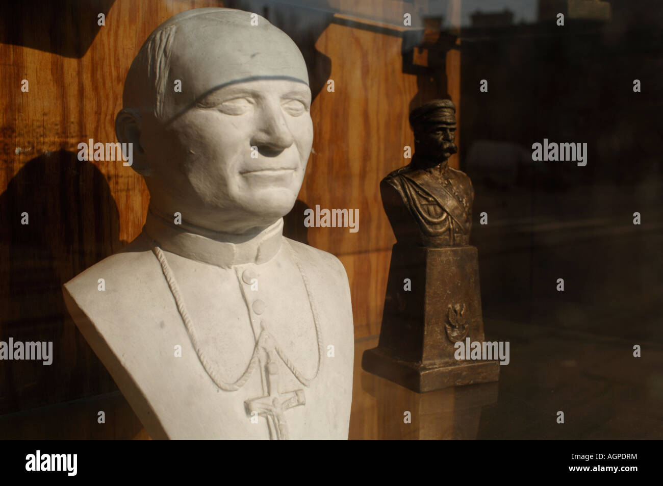 A bust of Pope John Paul II in the window of a shop in Krakow Poland ...