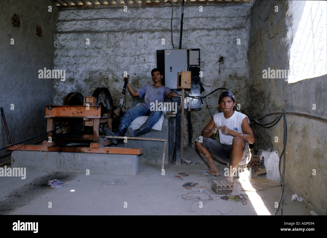 boy manufacturing electric detonators in the elevator operator room in ...