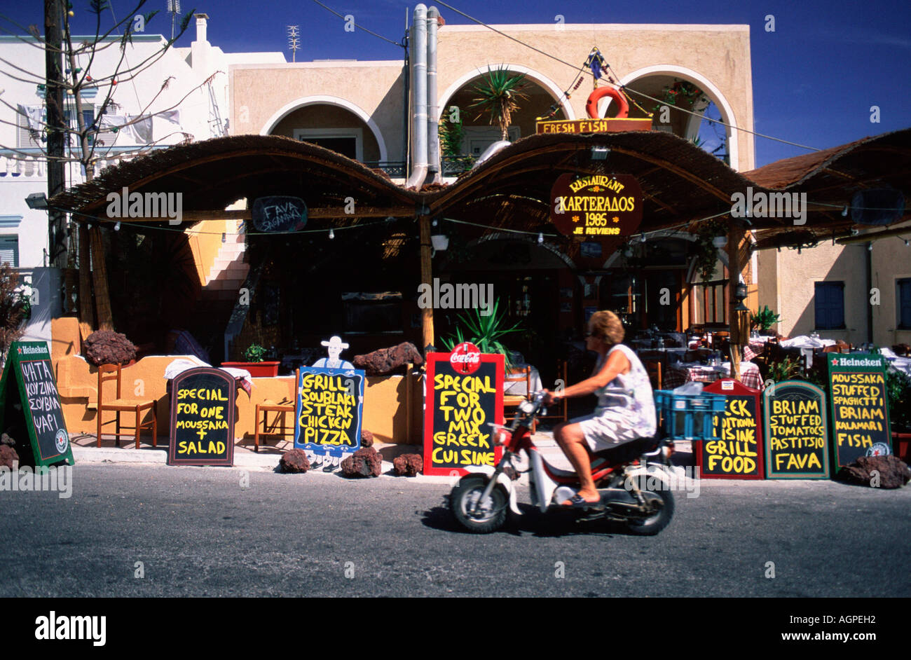 Motorscooter in front of restaurant / Motorroller vor Restaurant Stock ...