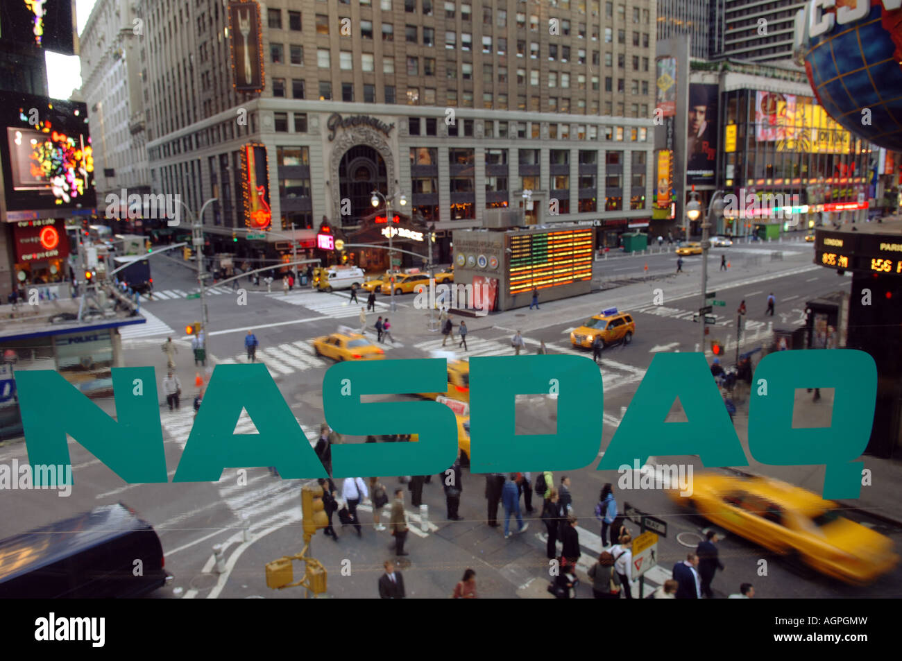 The Nasdaq logo appears on the windows of their headquarters in Times ...