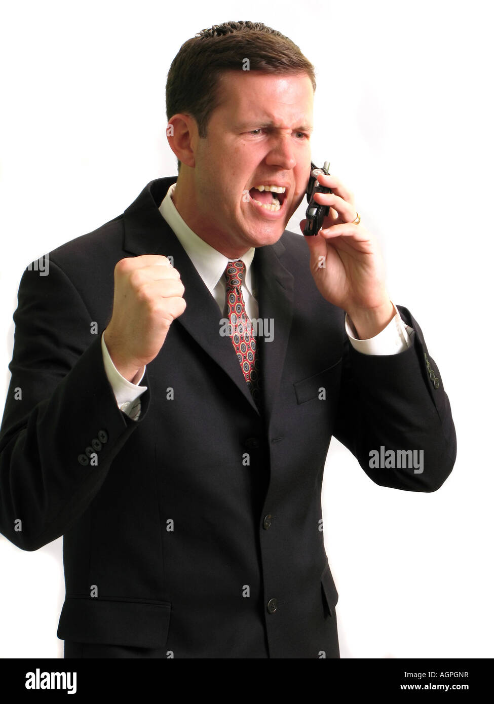 Angry business man yelling on phone Stock Photo - Alamy
