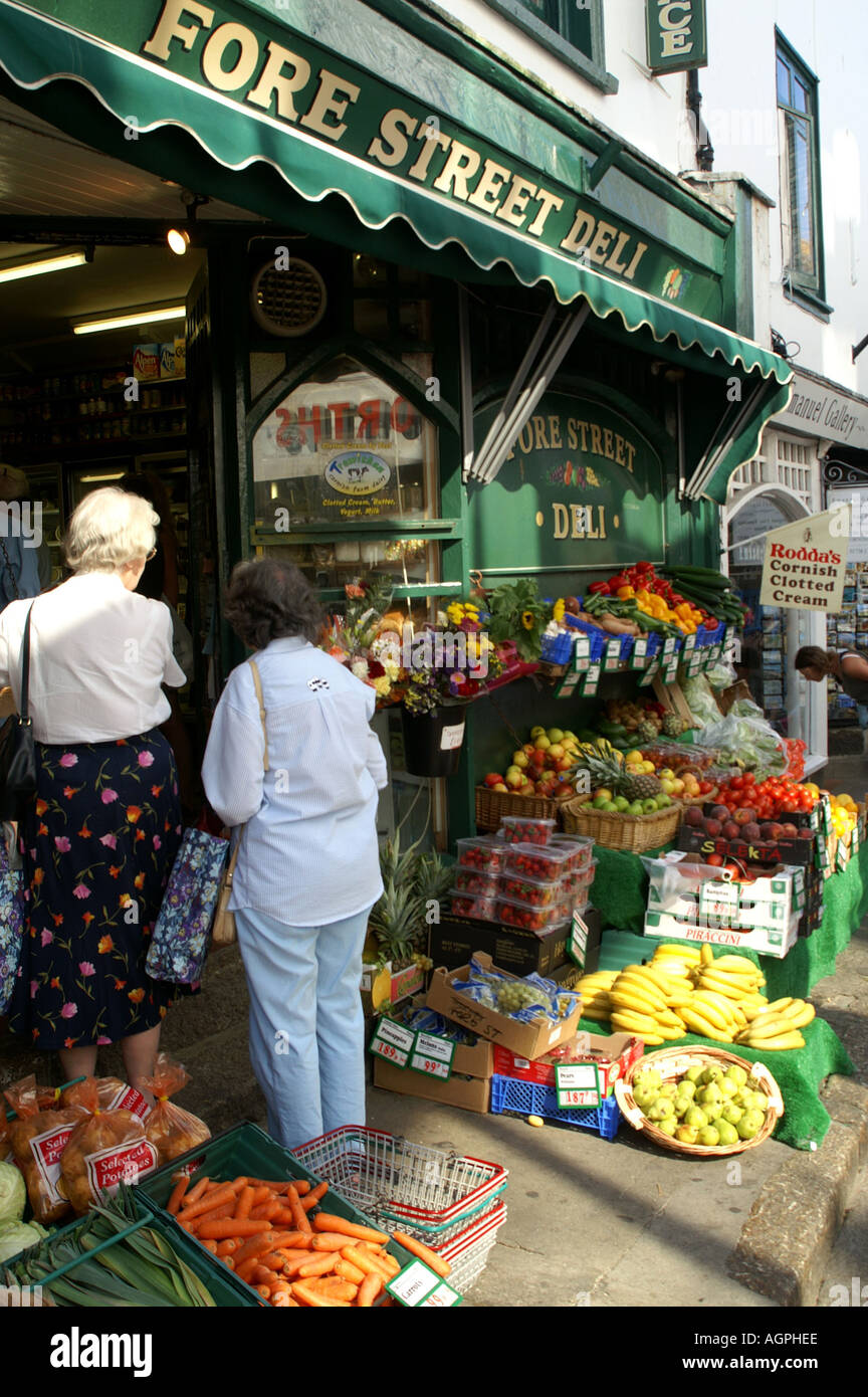 Fruit and vegetable displays on fore street in the village of St Ives ...