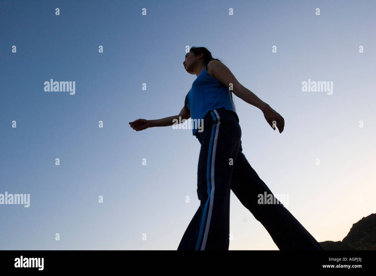 Woman Walking, Shot at Low Angle Stock Photo - Alamy