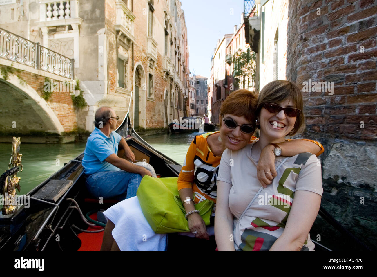 People on gondola Venice Stock Photo - Alamy