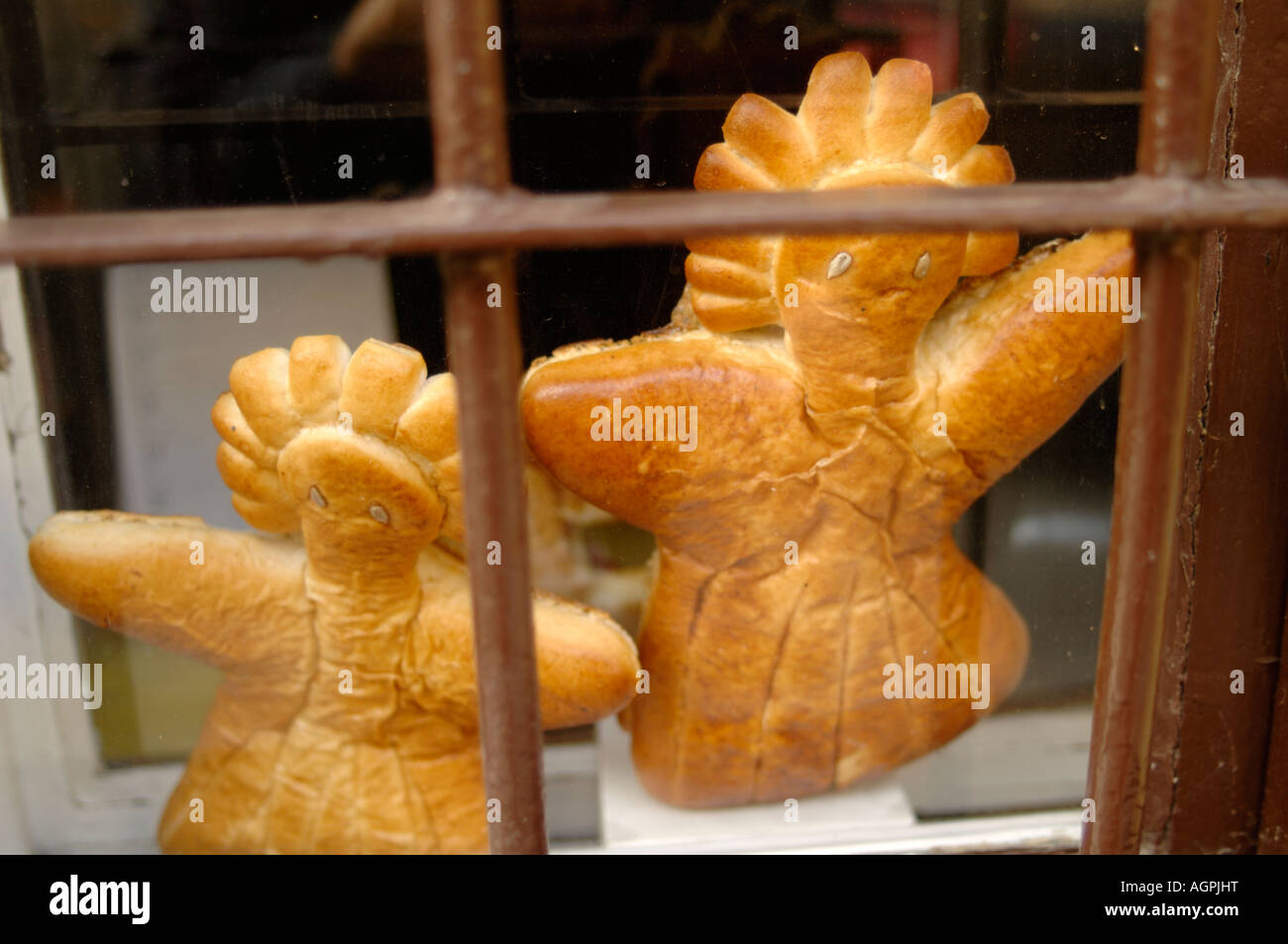 Figures made from bread in a shop window in Krakows Jewish quarter ...
