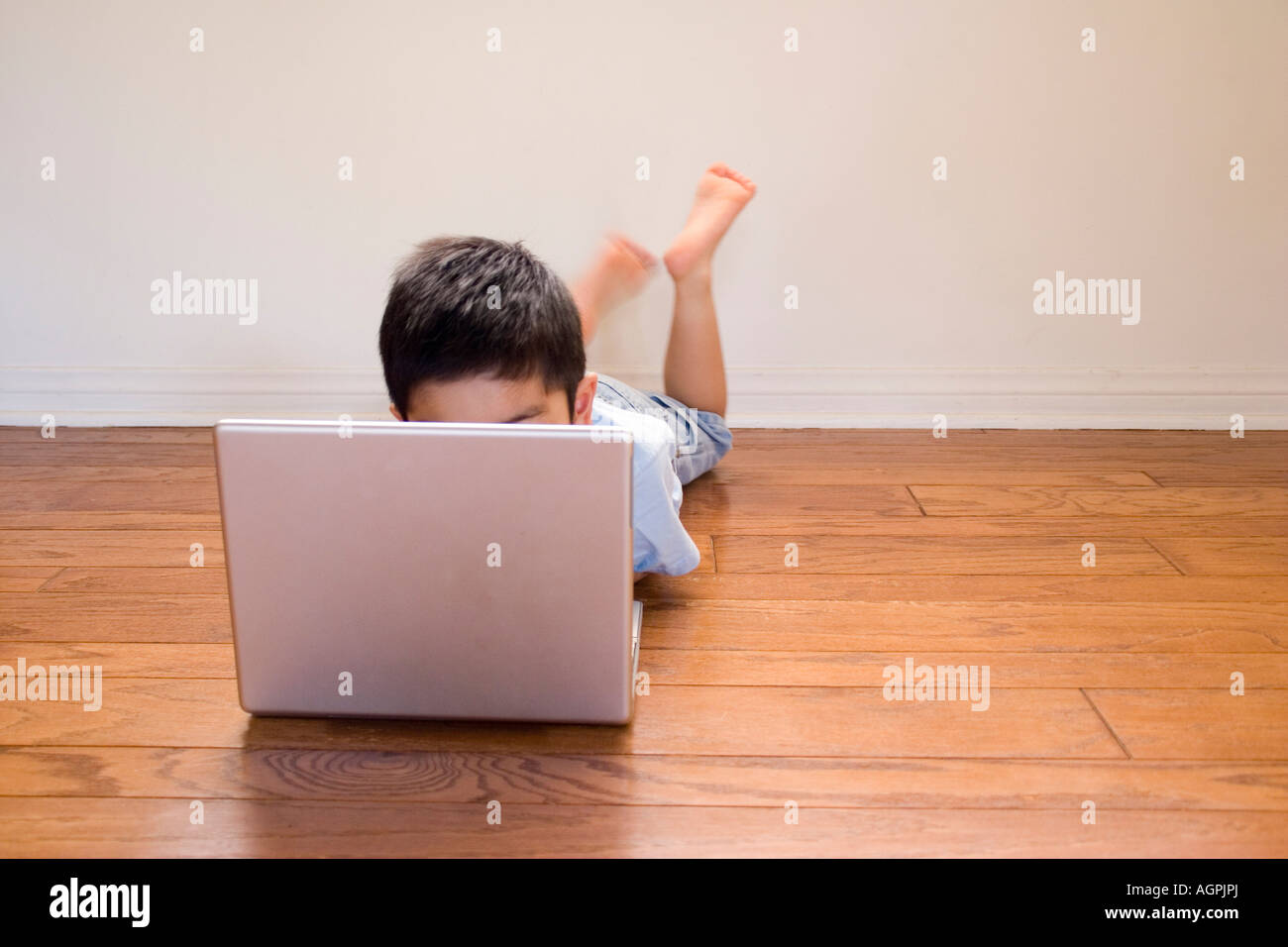 Little Boy on Laptop Computer Stock Photo - Alamy