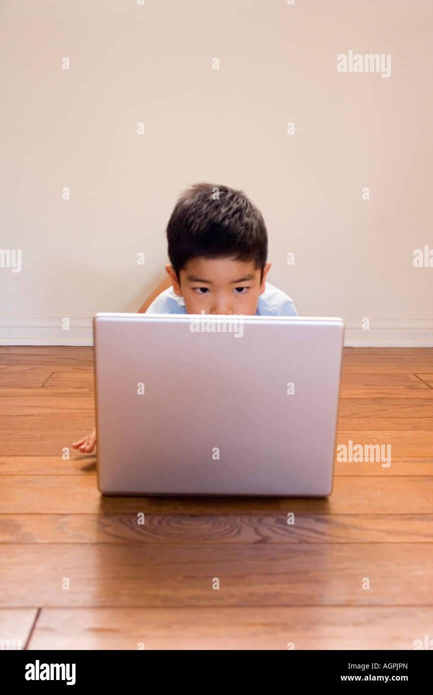 Little Boy on Laptop Computer Stock Photo - Alamy