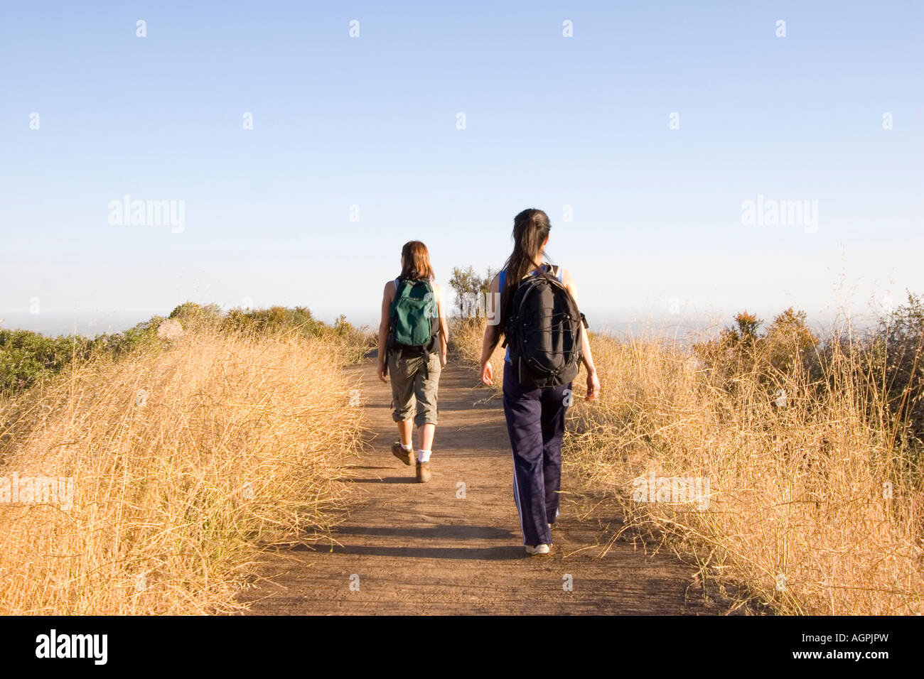 Two Women Hiking Stock Photo - Alamy
