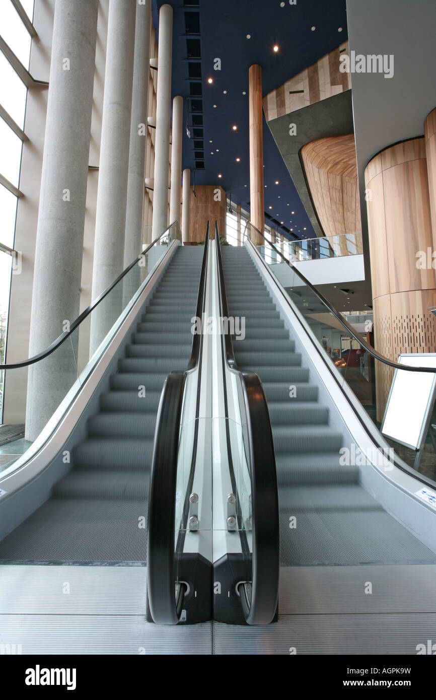 escalators in a modern interiors Stock Photo - Alamy