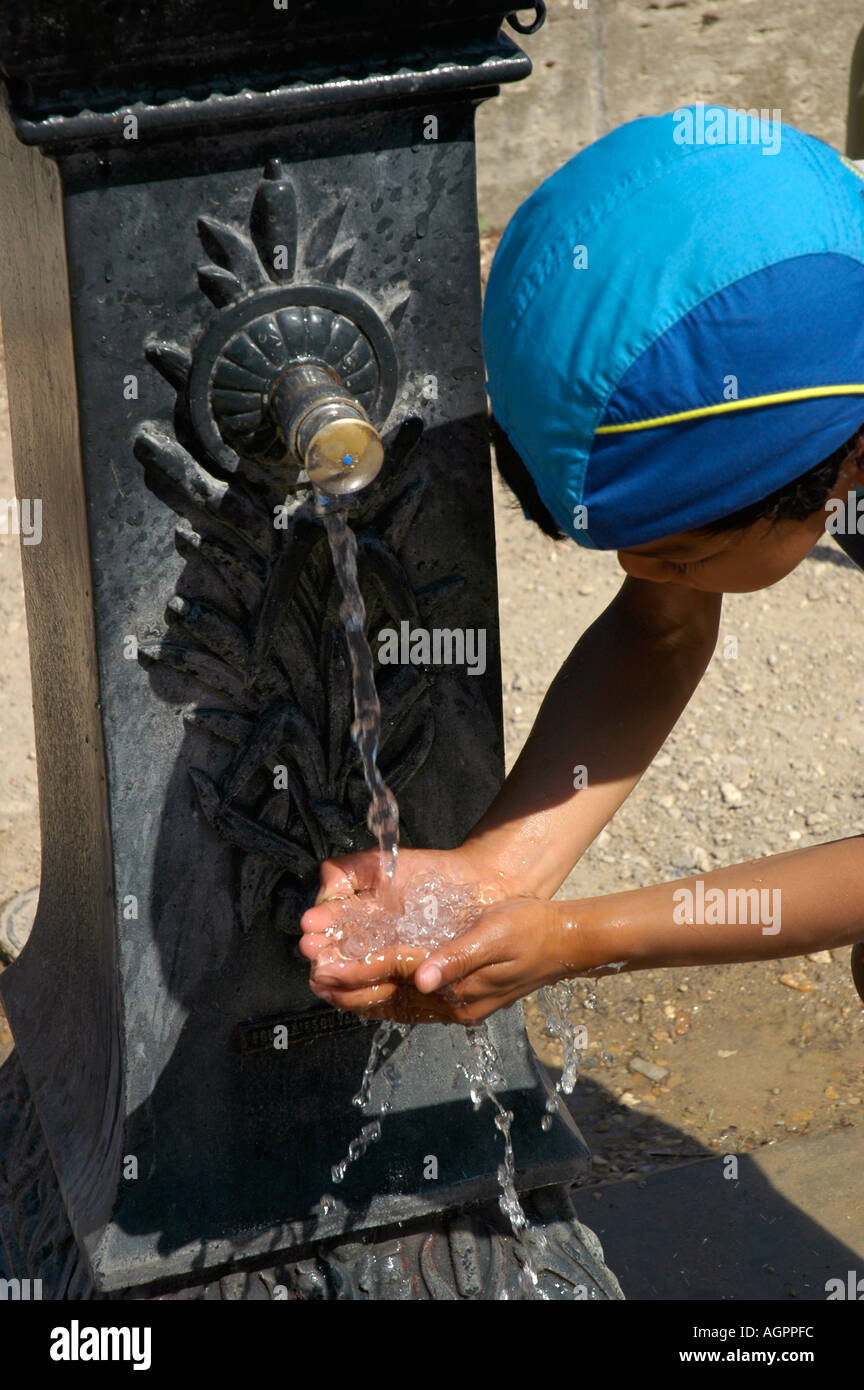 Boy drink water tap hi-res stock photography and images - Alamy