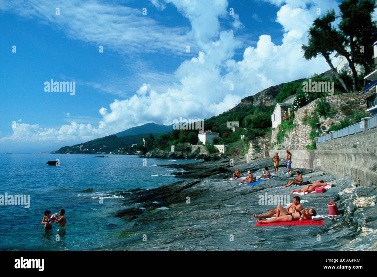 People at beach / Erbalunga / Menschen am Strand Stock Photo - Alamy