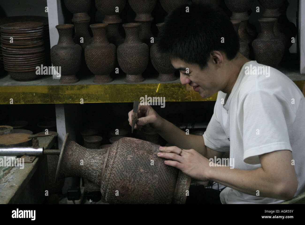 chinese worker in vase factory Beijing China August 2007 Stock Photo ...
