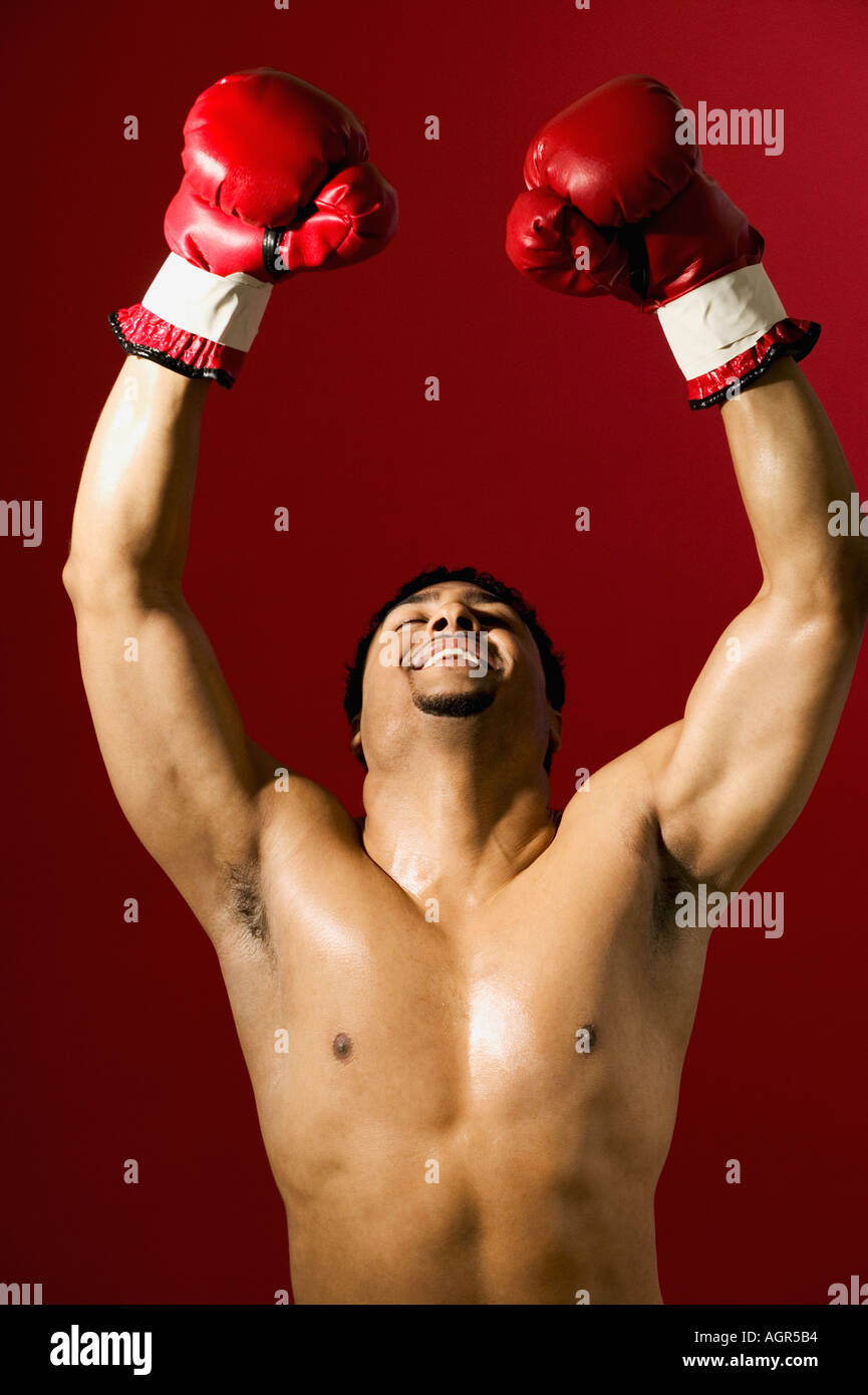 Portrait of male boxer celebrating Stock Photo - Alamy