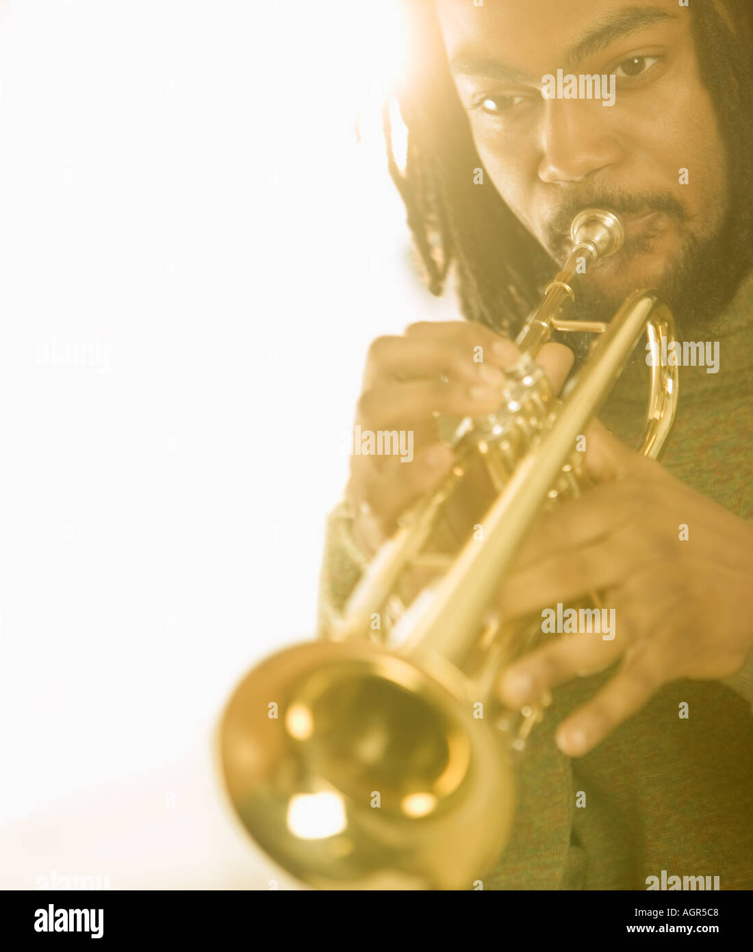 African man playing trumpet hi-res stock photography and images - Alamy