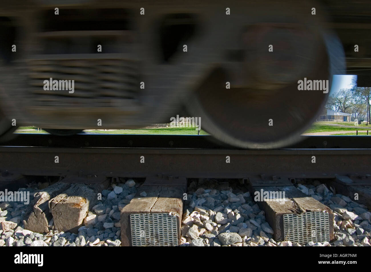 Train wheels in motion with a blur Stock Photo - Alamy