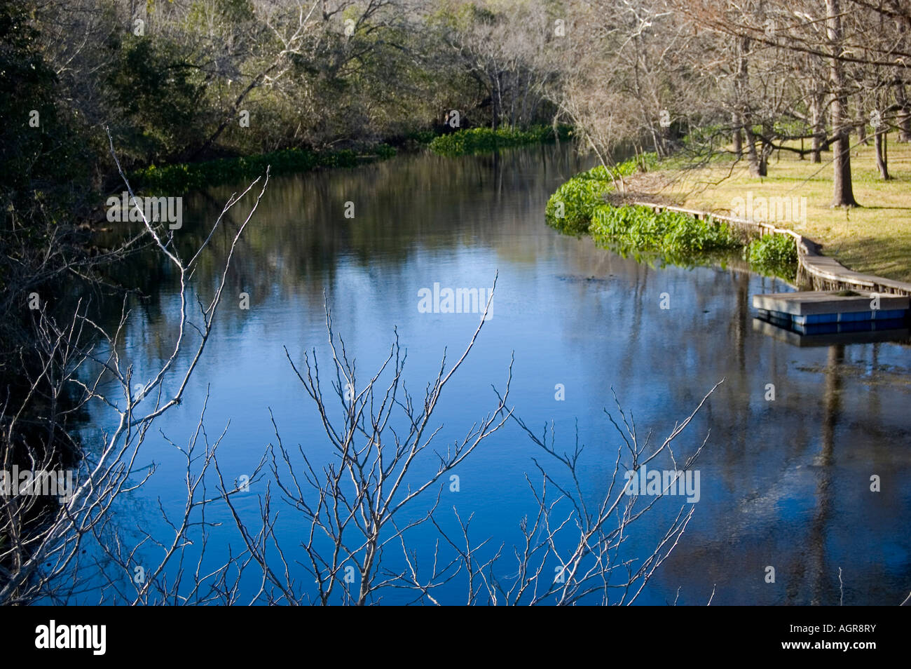 River landscape scene with blue reflection form the sky Stock Photo - Alamy