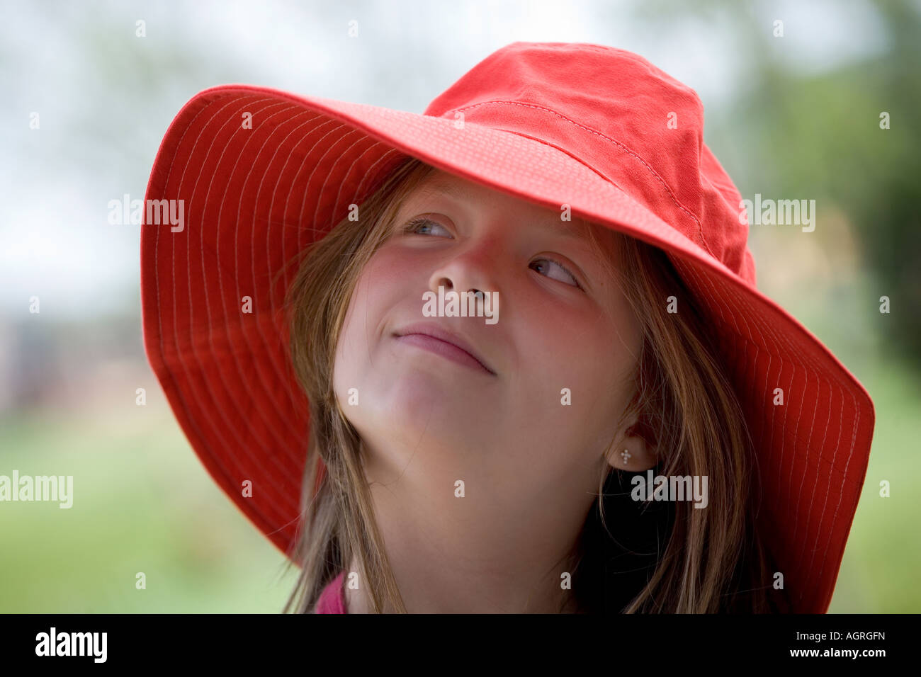 Young girl in red hat Stock Photo - Alamy
