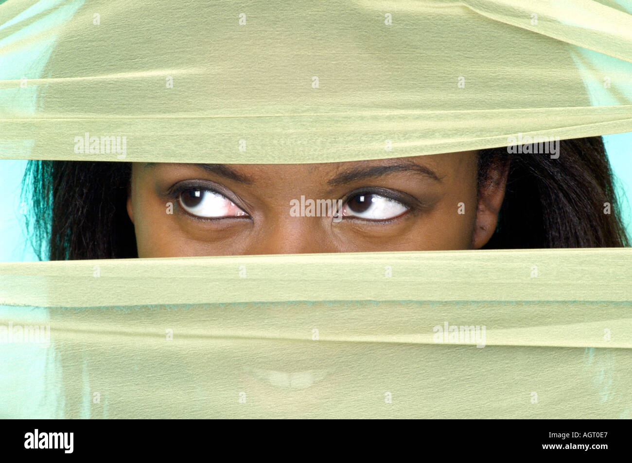 Women peaking from behind a veil Stock Photo - Alamy