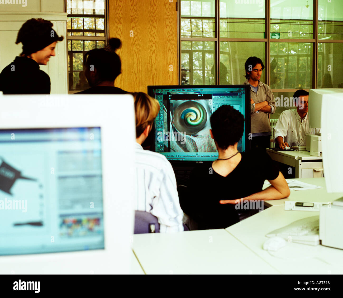 Design studio with workers and computors Stock Photo - Alamy