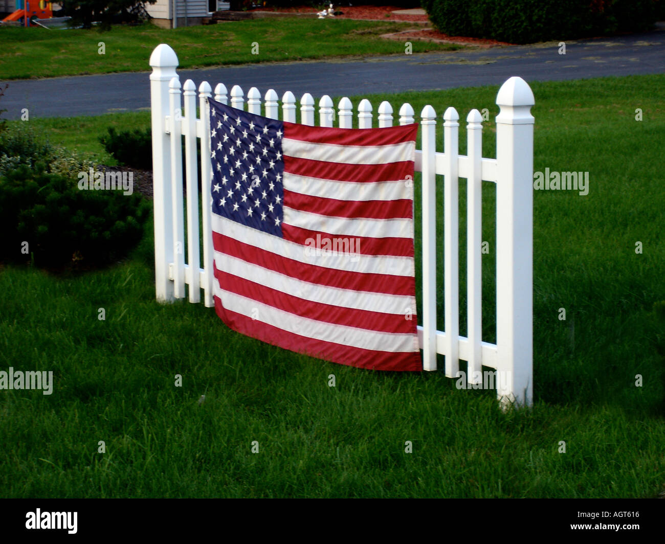Patriotic fence with US flag Stock Photo - Alamy