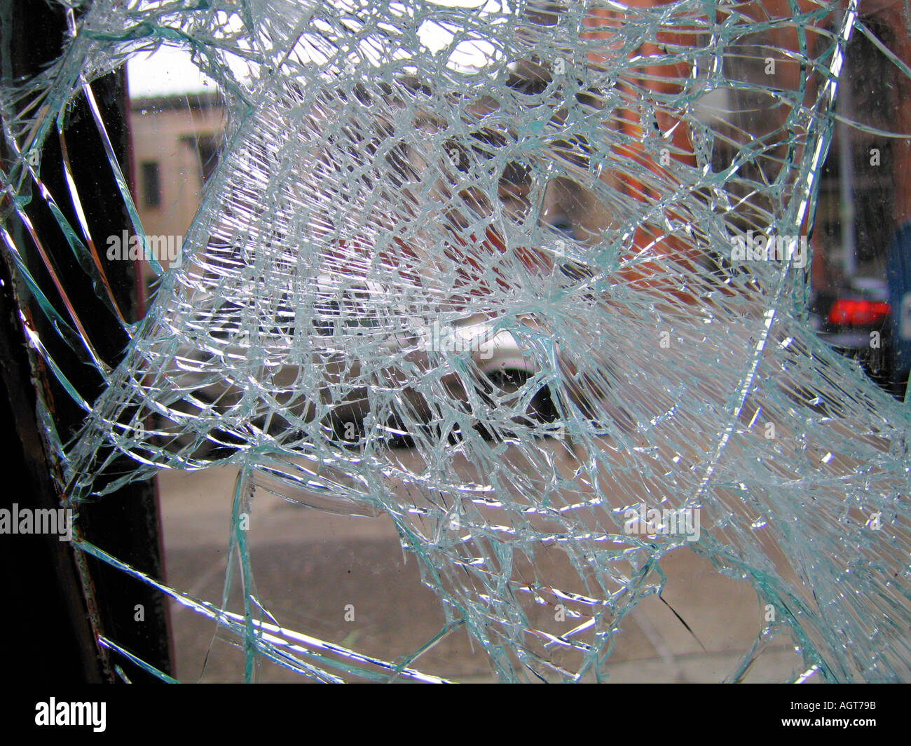 Crime broken window Stock Photo - Alamy