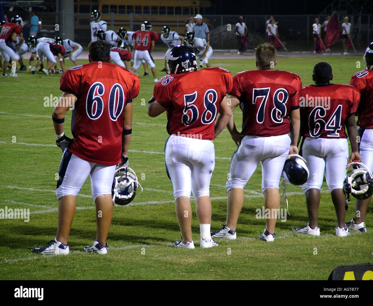 American College boys in football kit on touch line USA Stock Photo - Alamy