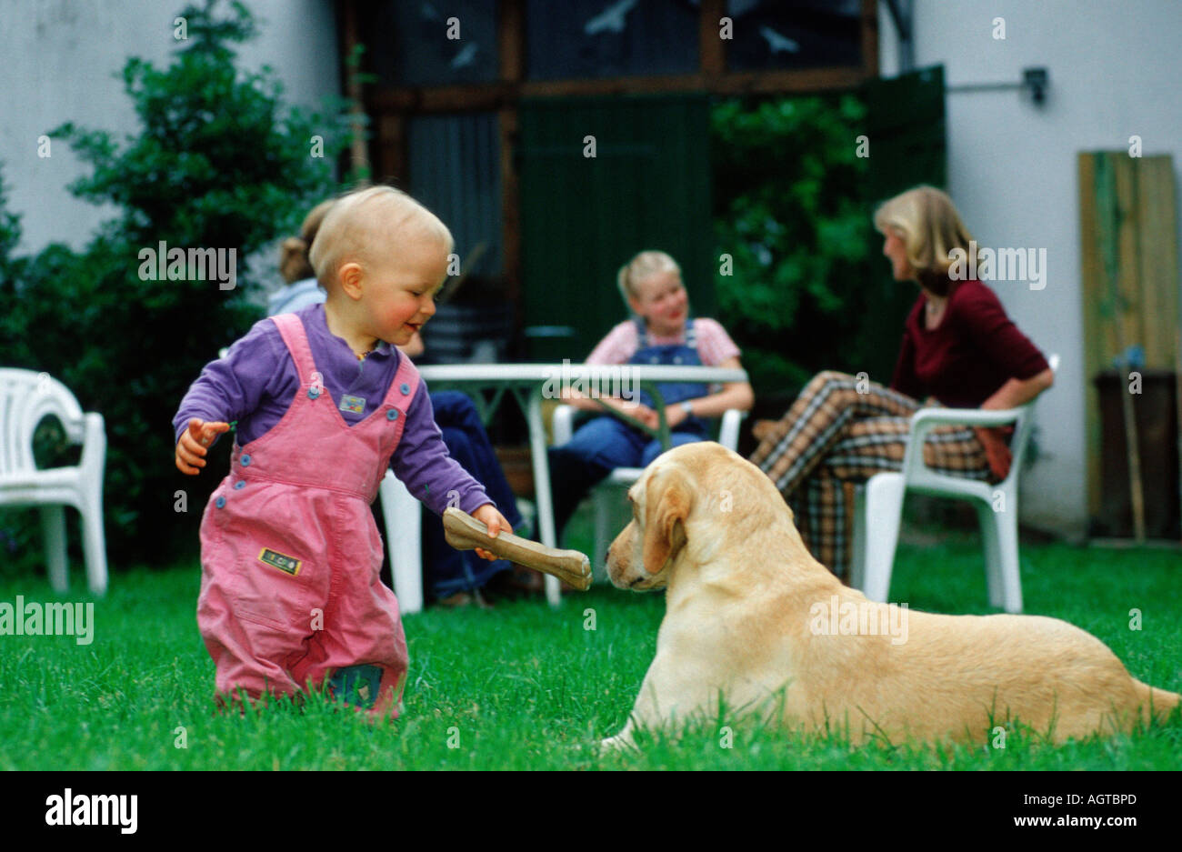 Baby and Labrador Retriever Stock Photo - Alamy