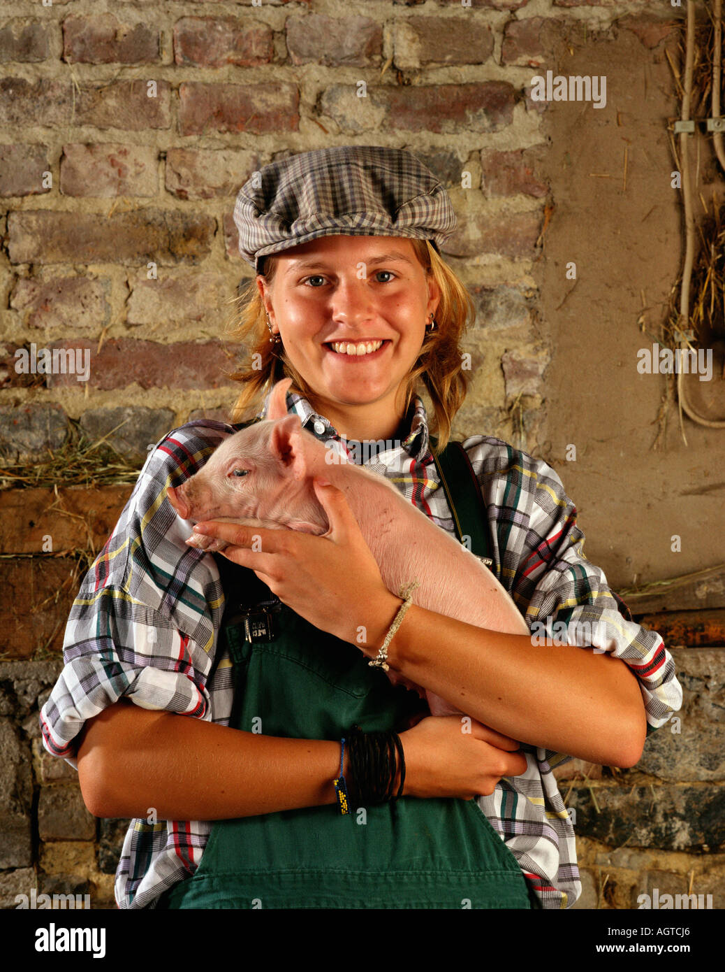 Girl and piglet hi-res stock photography and images - Alamy