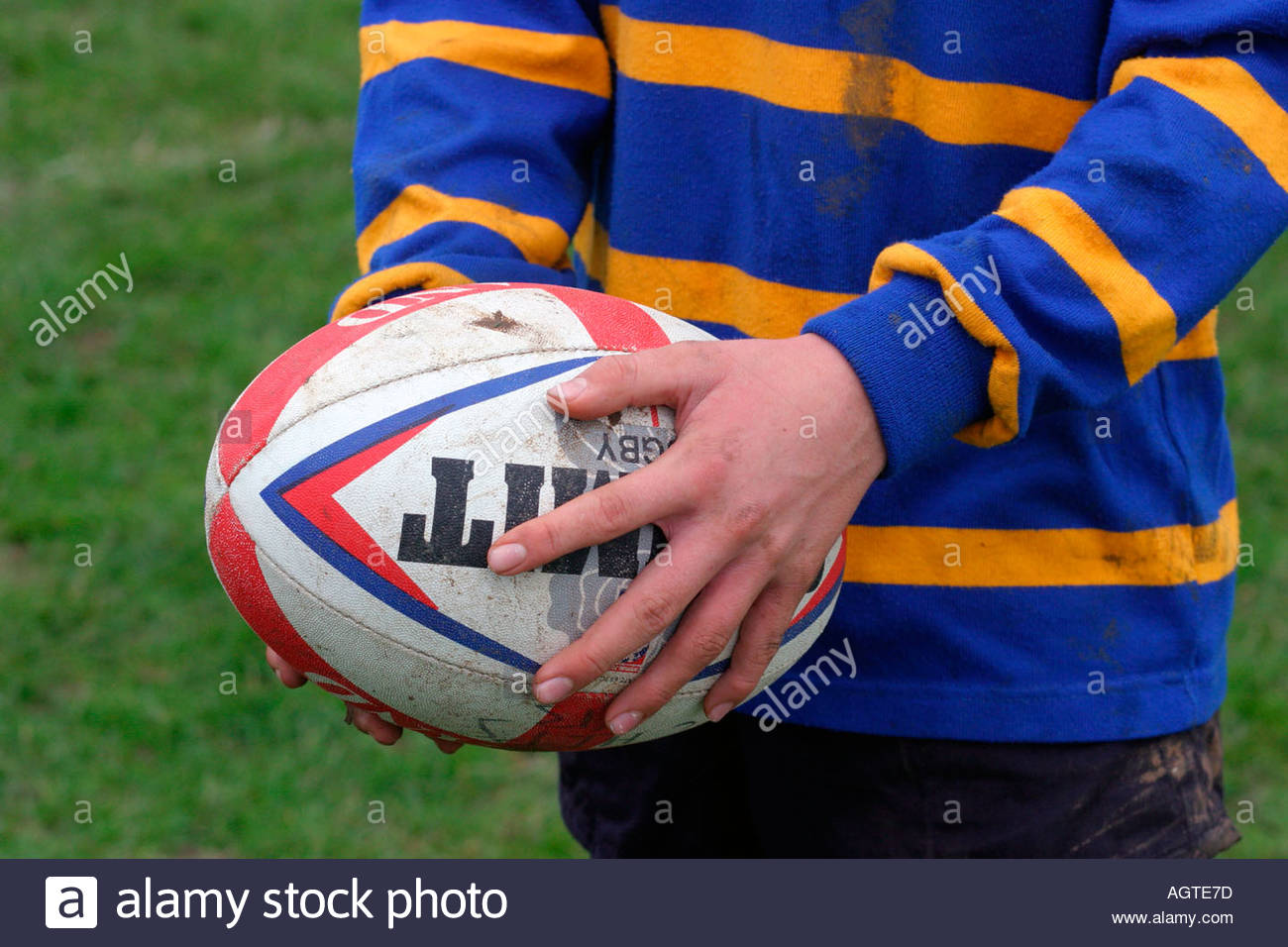 Boy Holding Rugby Ball High Resolution Stock Photography and Images - Alamy