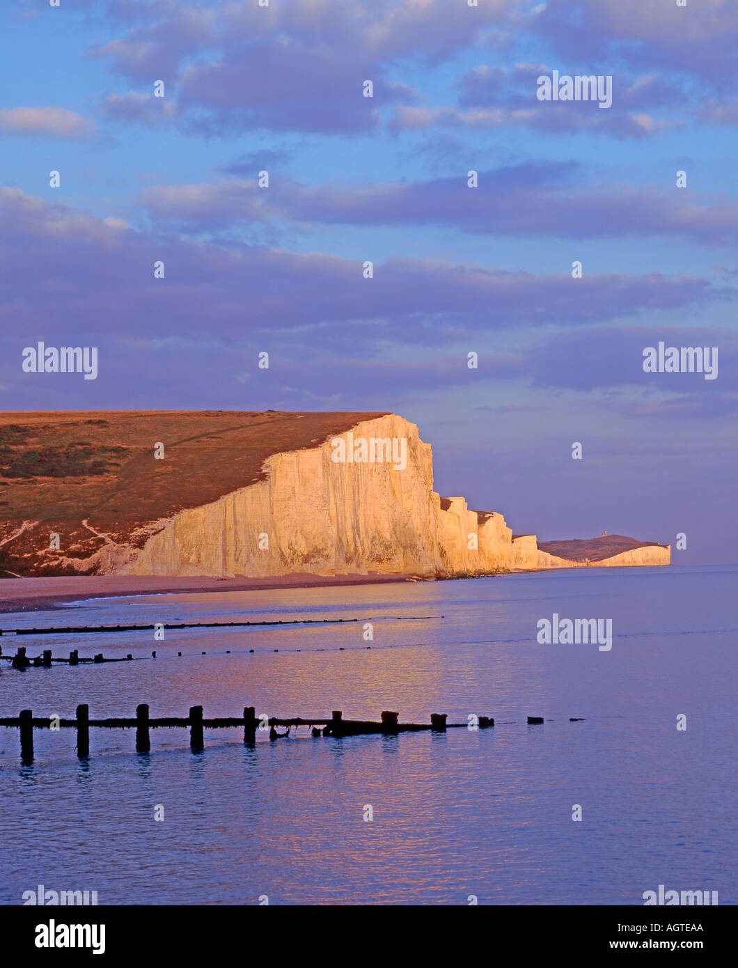 Seven Sisters Chalk cliffs in evening sunlight Stock Photo - Alamy
