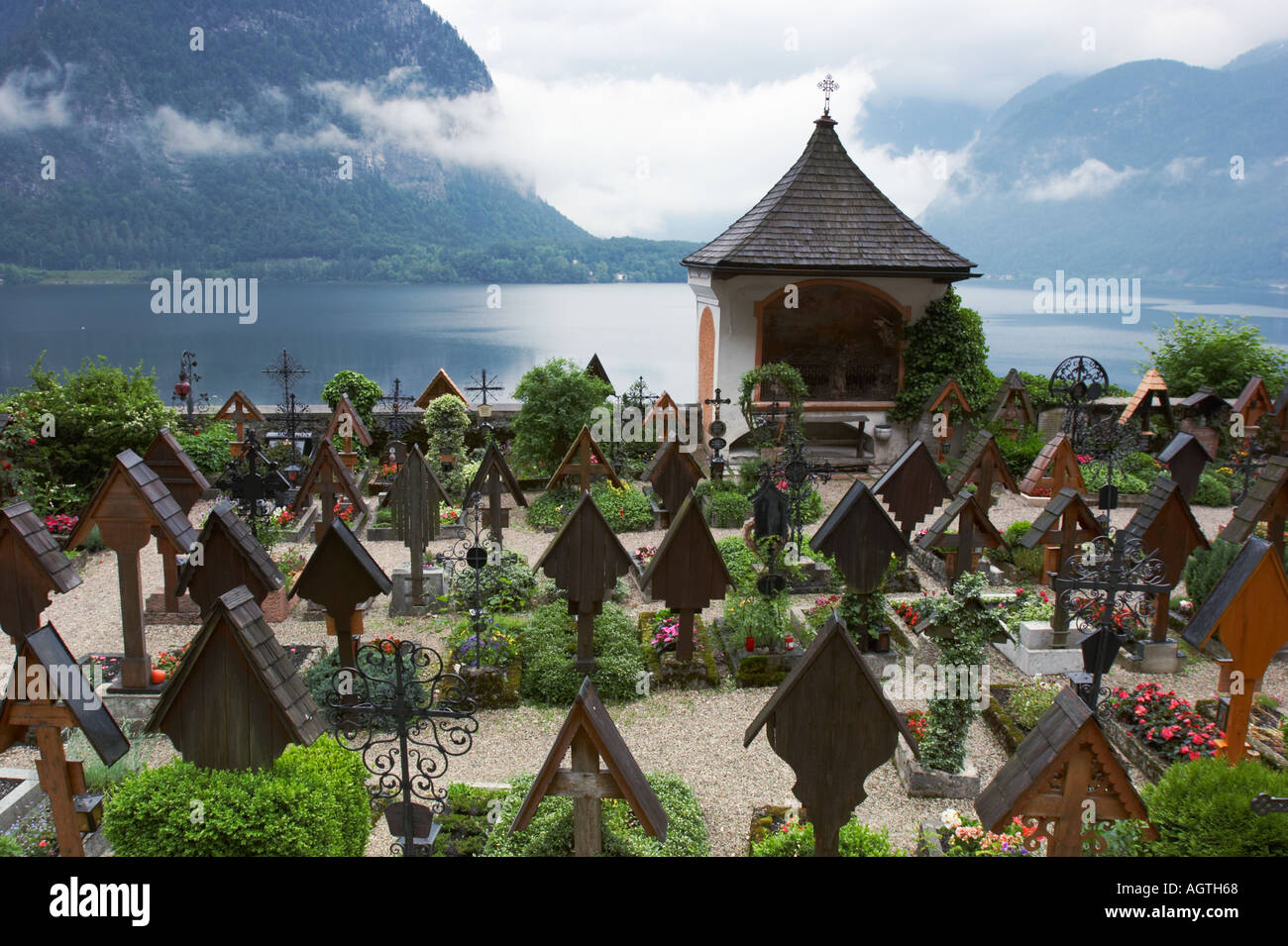Small cemetery overlooking the Hallstatt lake and surrounding mountains ...