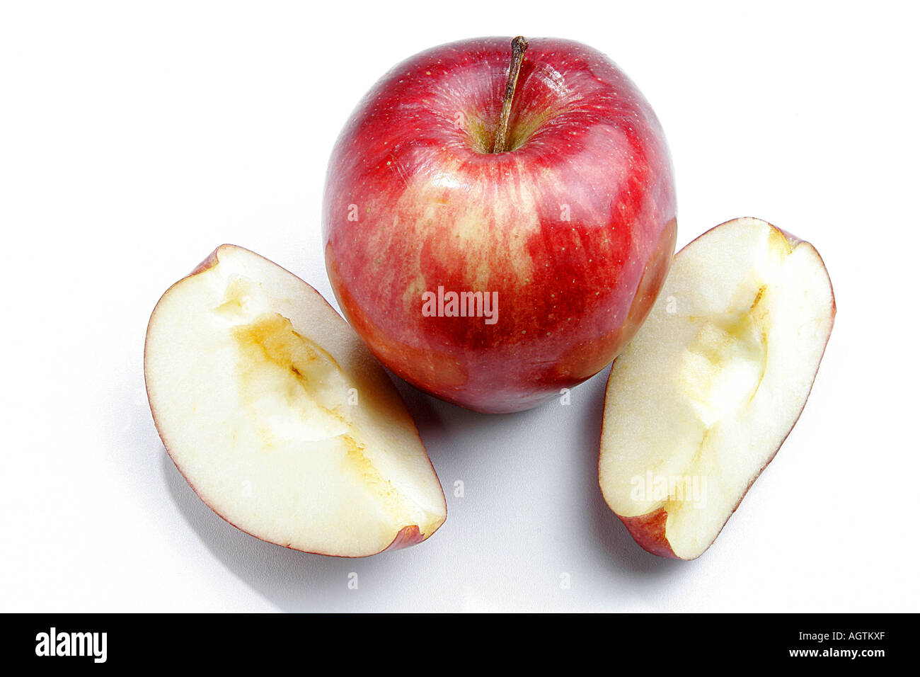 SSK79617 One Red Apple and two cut pieces healthy fruit Stock Photo - Alamy
