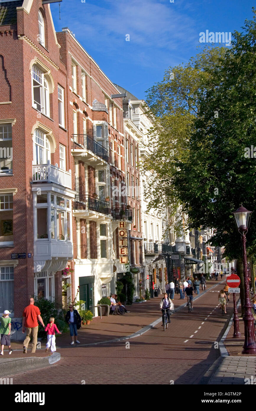 Row houses along the Amstel River in Amsterdam Netherlands Stock Photo ...