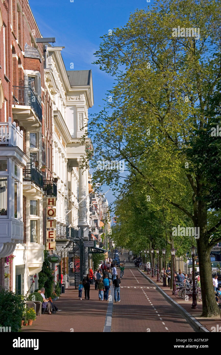 Row houses along the Amstel River in Amsterdam Netherlands Stock Photo ...