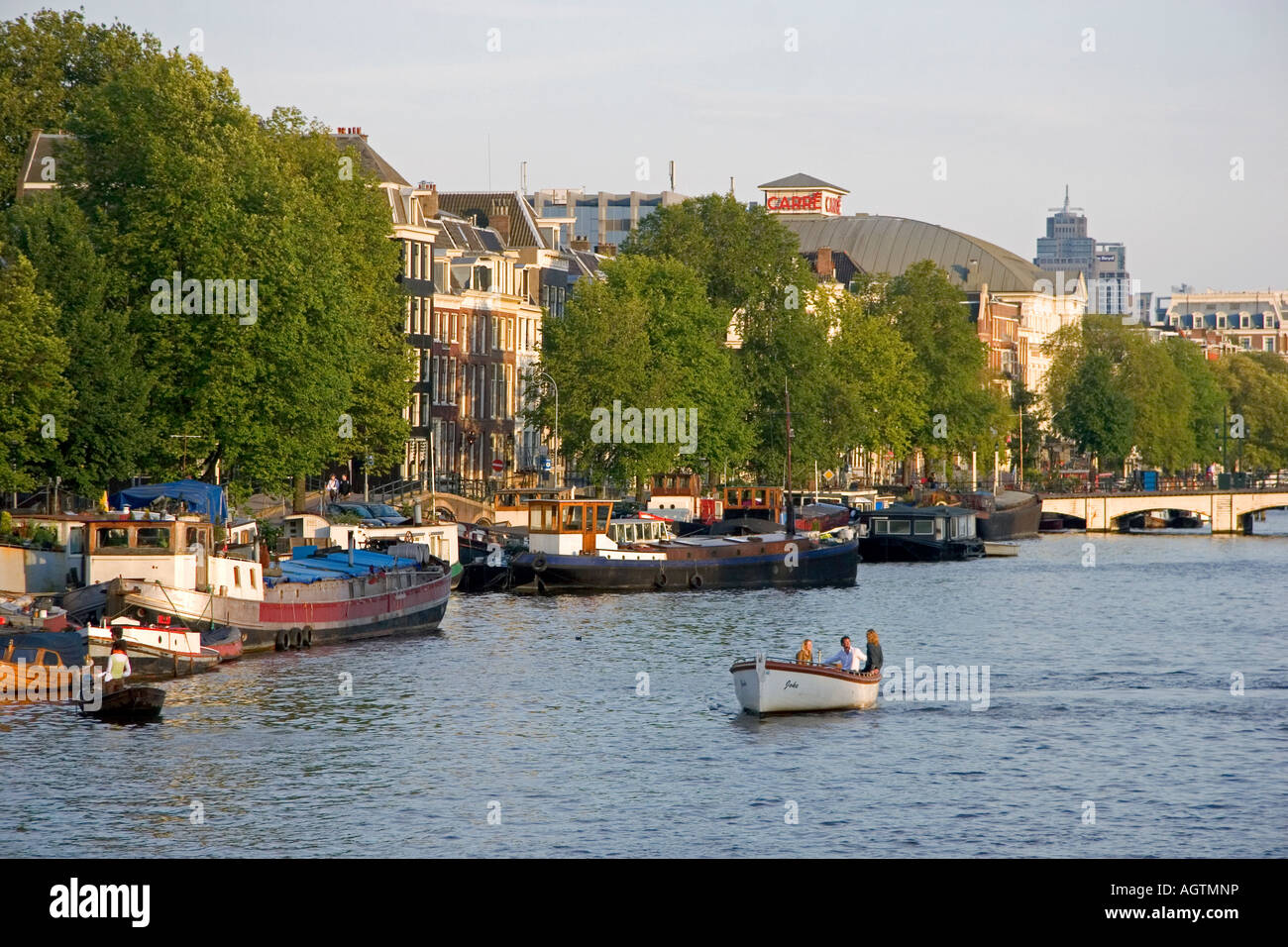 Boating on the Amstel River in Amsterdam Netherlands Stock Photo - Alamy