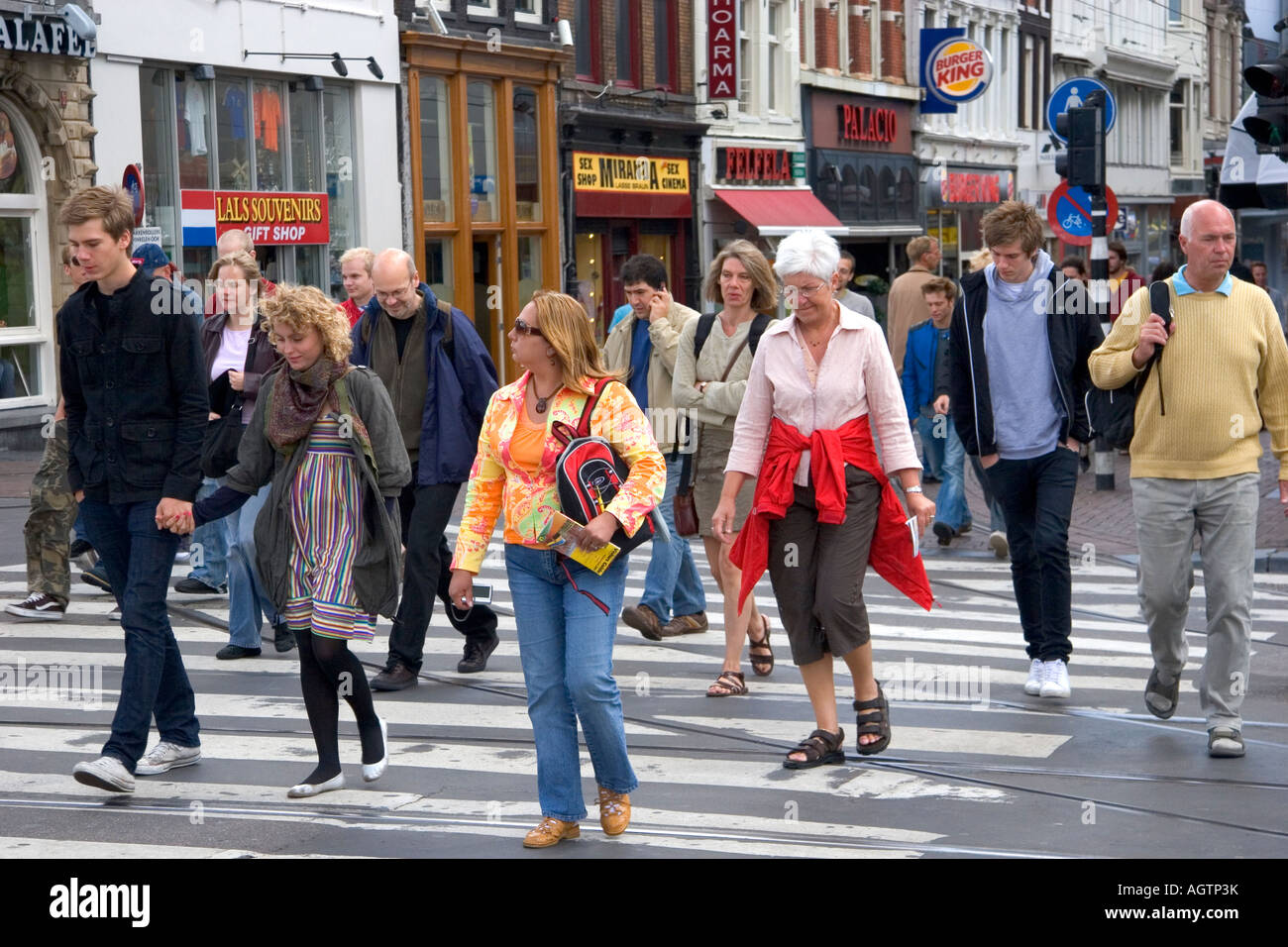 Pedestrians crossing street in amsterdam hi-res stock photography and ...