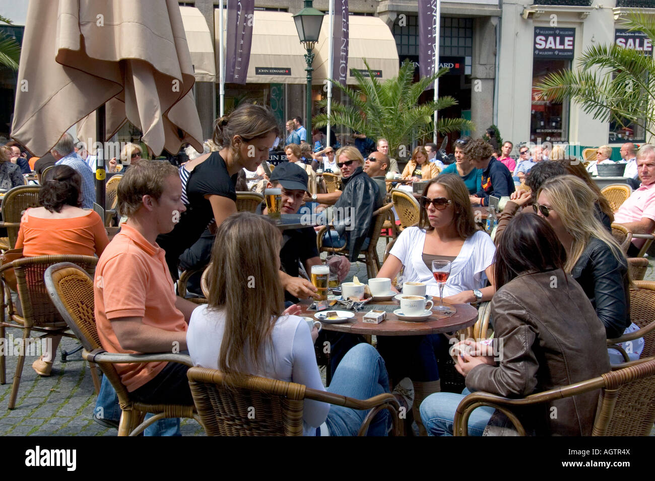Dutch students have coffee and beer outdoors at The Hague in the ...