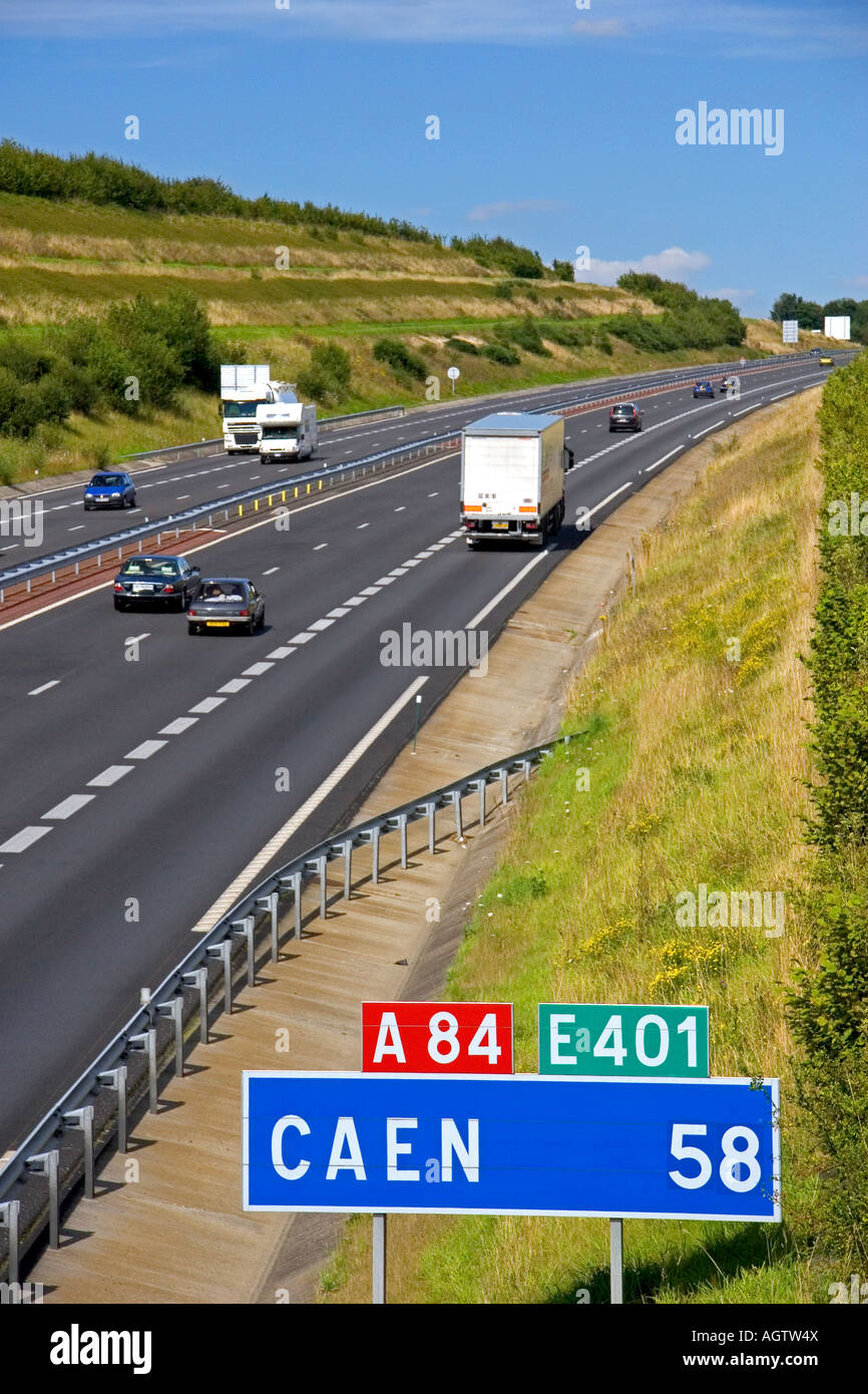 Autos travel on the motorway A84 southwest of Caen in the region of ...