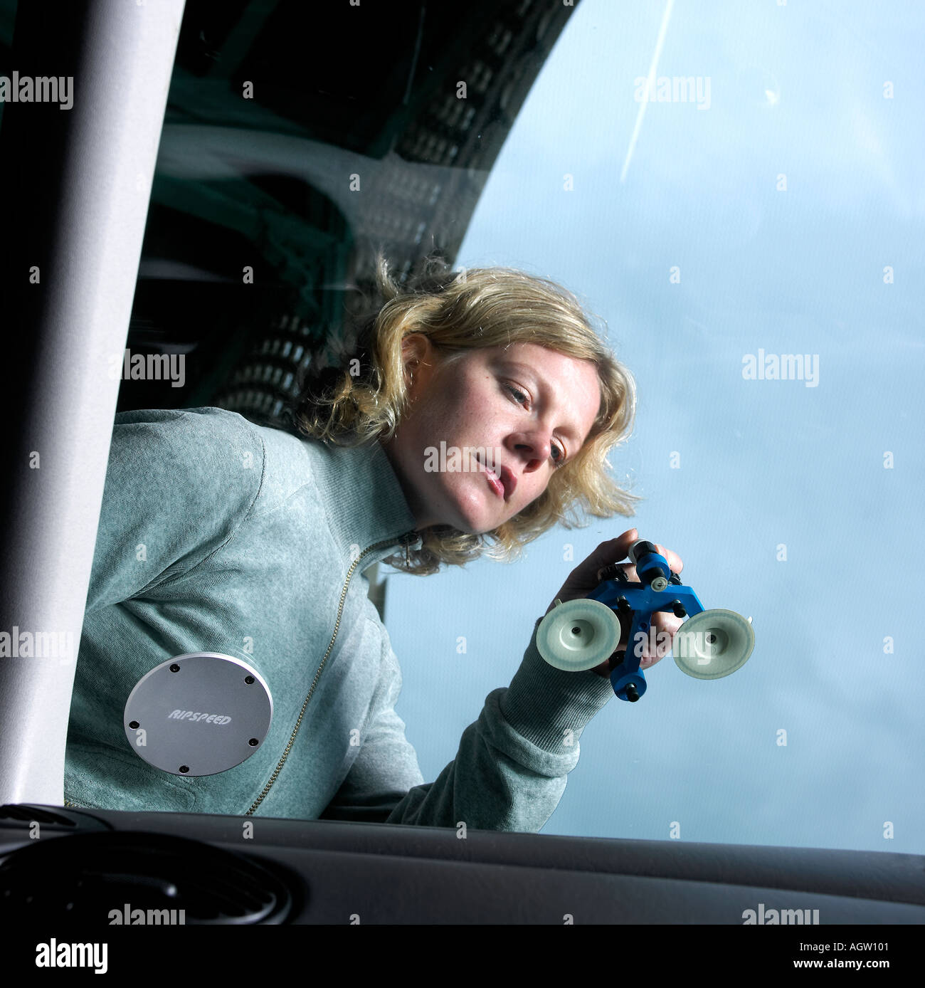 Repairing a chip in a windscreen Stock Photo - Alamy